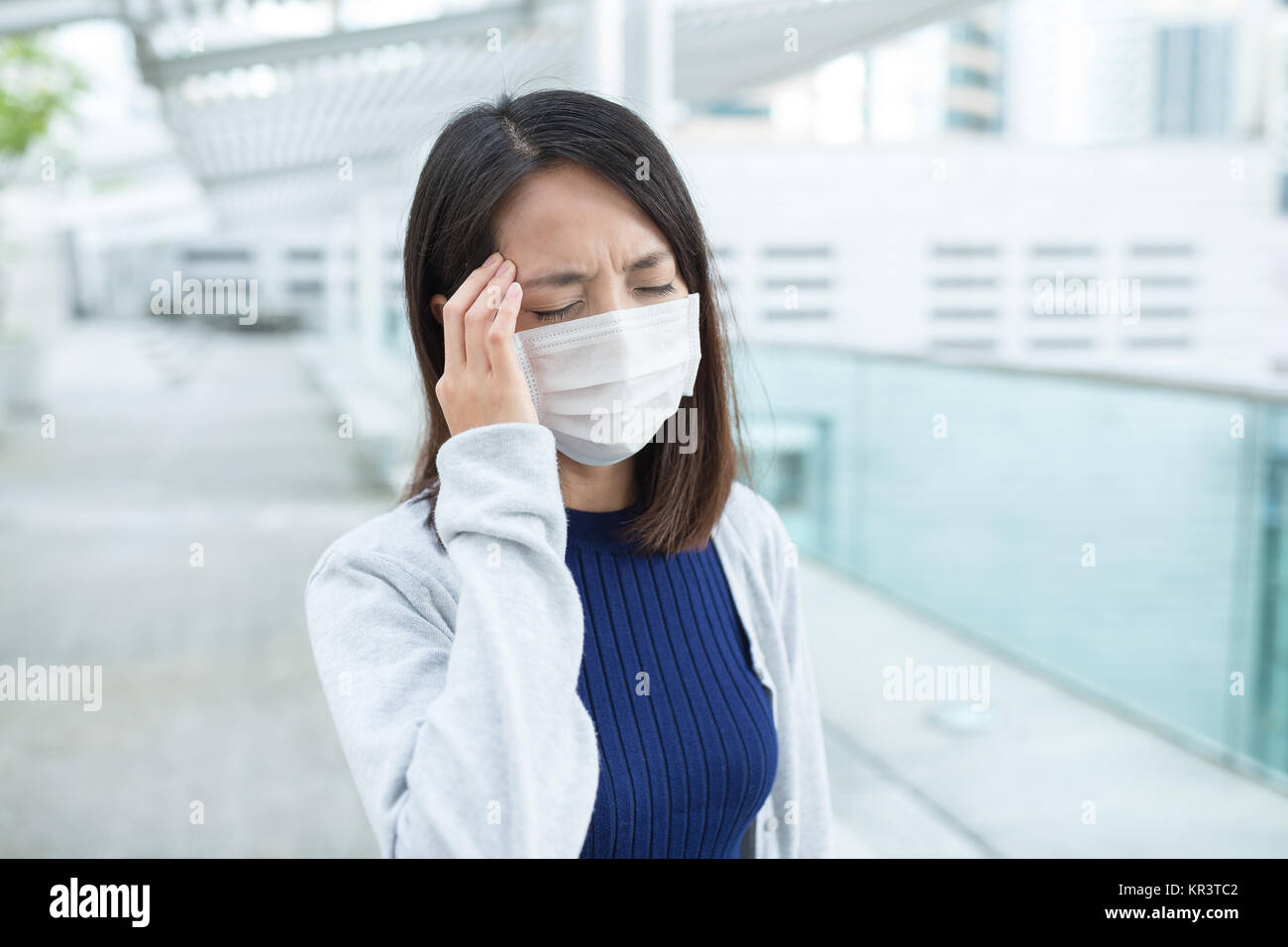 Woman getting sick Stock Photo - Alamy