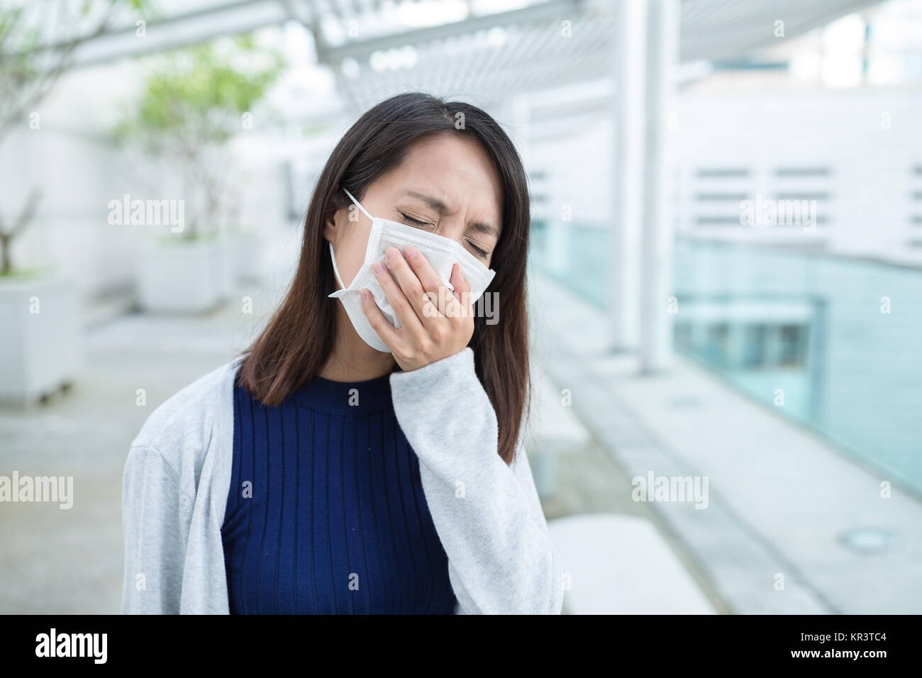 Woman feeling unwell at outdoor Stock Photo - Alamy
