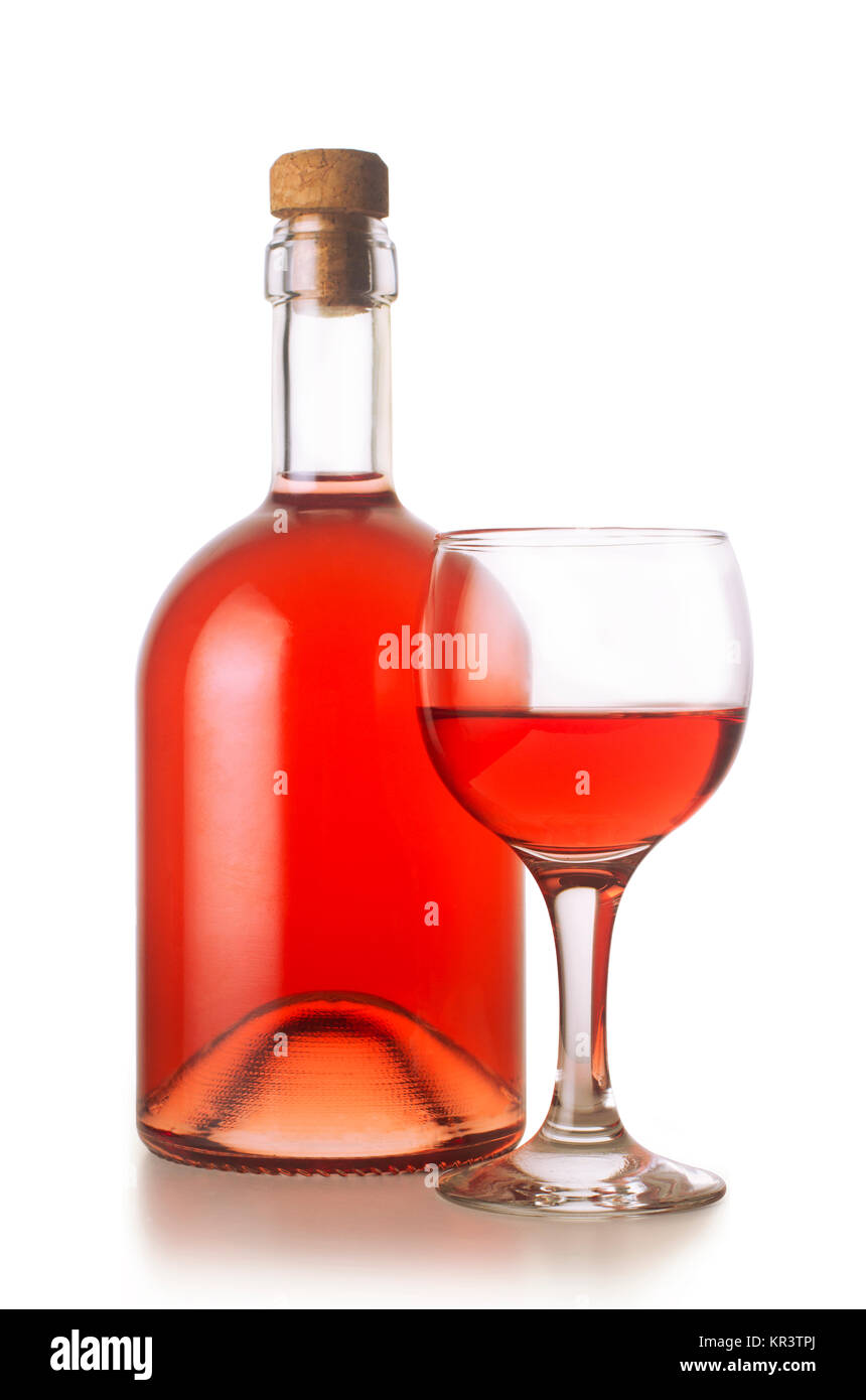 Small rose wine bottle with glass Stock Photo - Alamy
