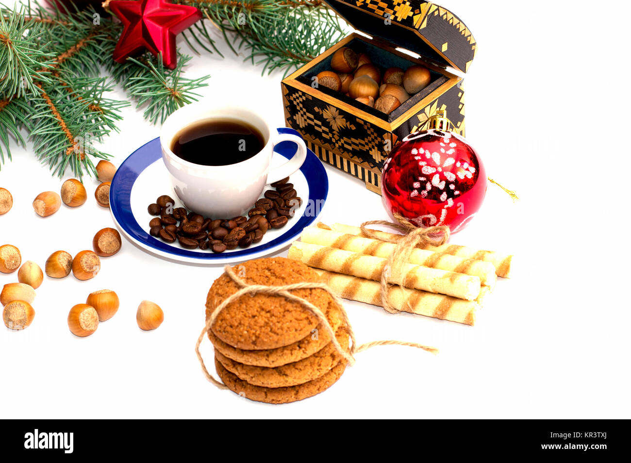 coniferous branch, baking, coffee and nutlets, still life Stock Photo ...