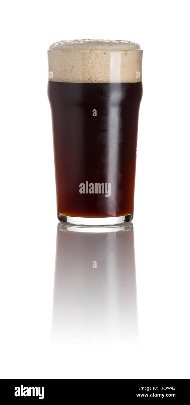 black beer in a pint glass against white background Stock Photo - Alamy