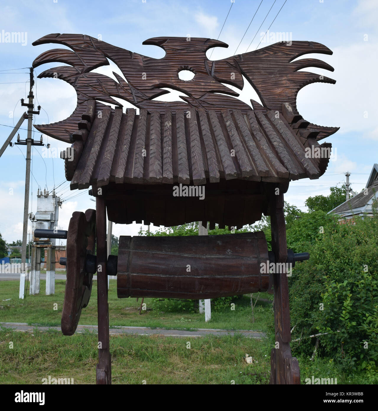 Wooden well for yard decorations Stock Photo - Alamy