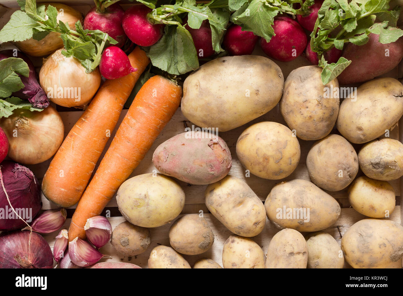 vegetables and root vegetables in a wooden box Stock Photo - Alamy