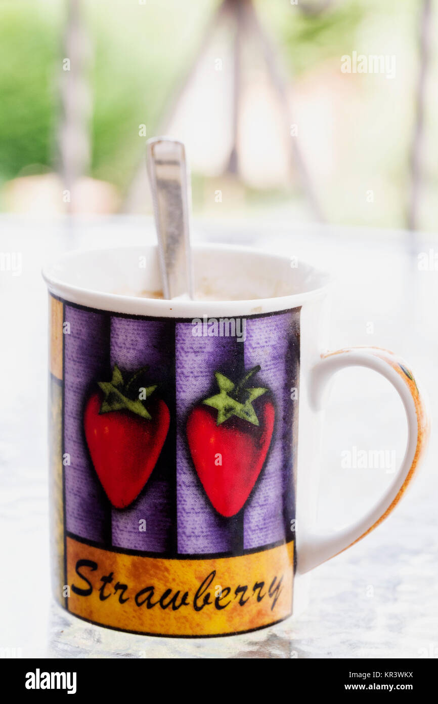Mug outdoor over table Stock Photo - Alamy