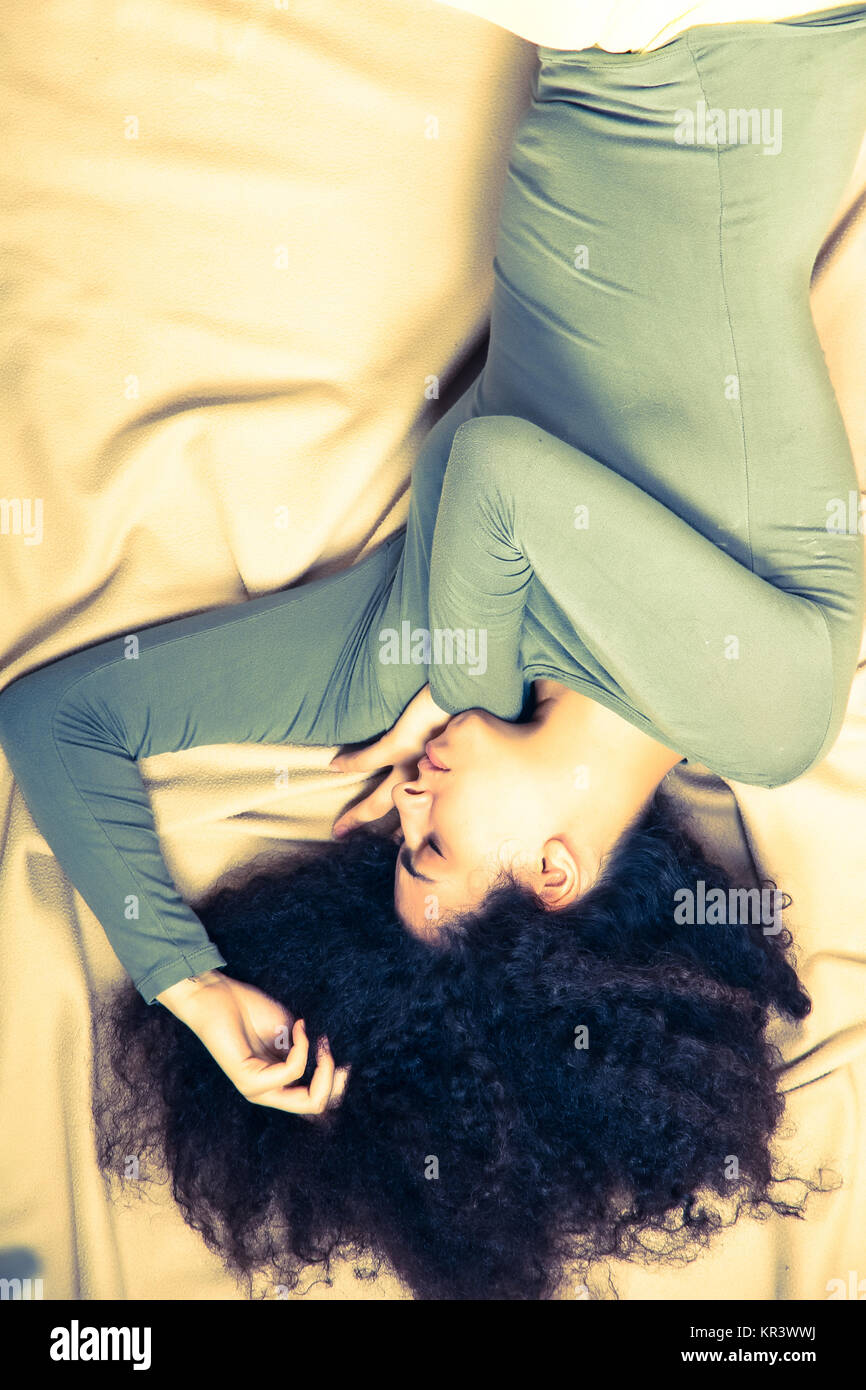 A brazilian woman having a bad night with nightmares Stock Photo - Alamy