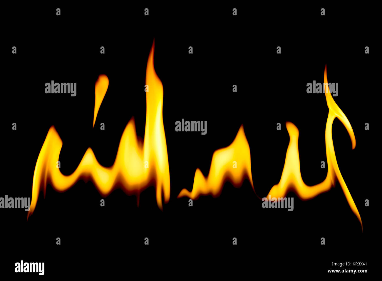 Horizontal row of yellow hot burning flames over black background for ...