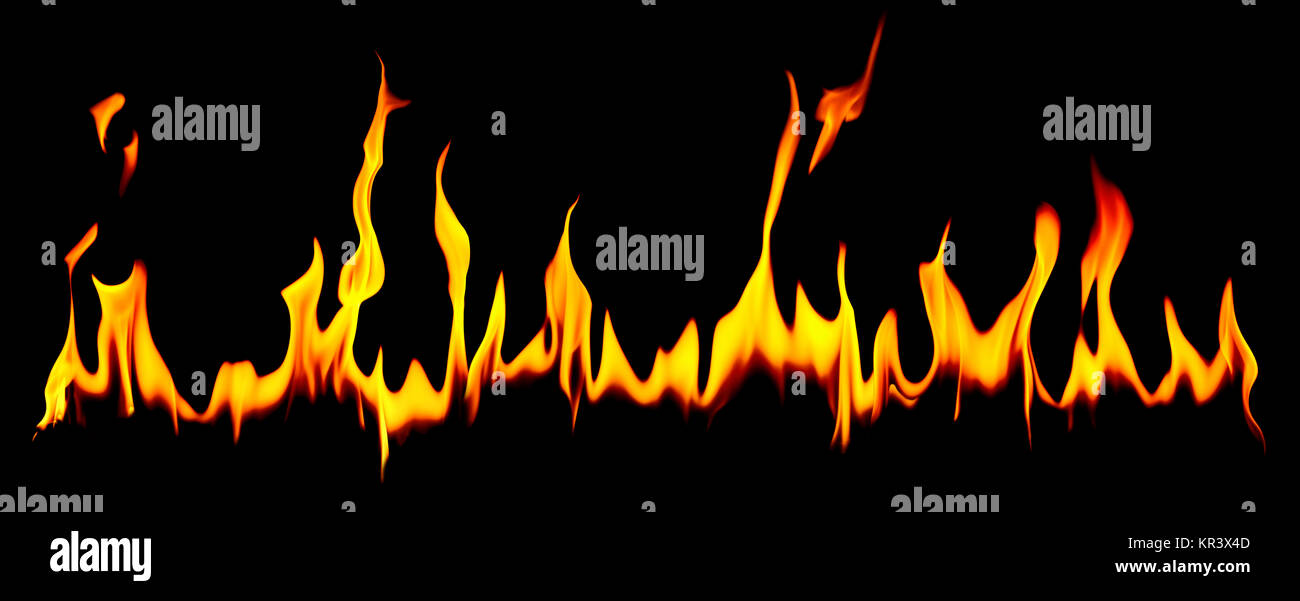 Long row of fiery flames over black background with copy space for ...