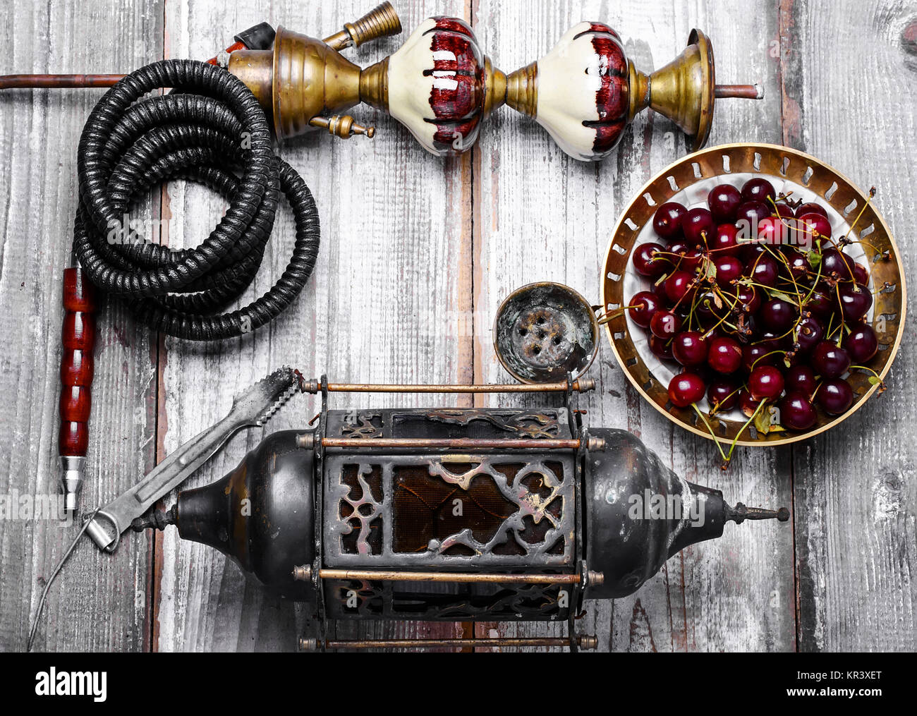 Details Eastern smoking hookah with berry cherry Stock Photo - Alamy