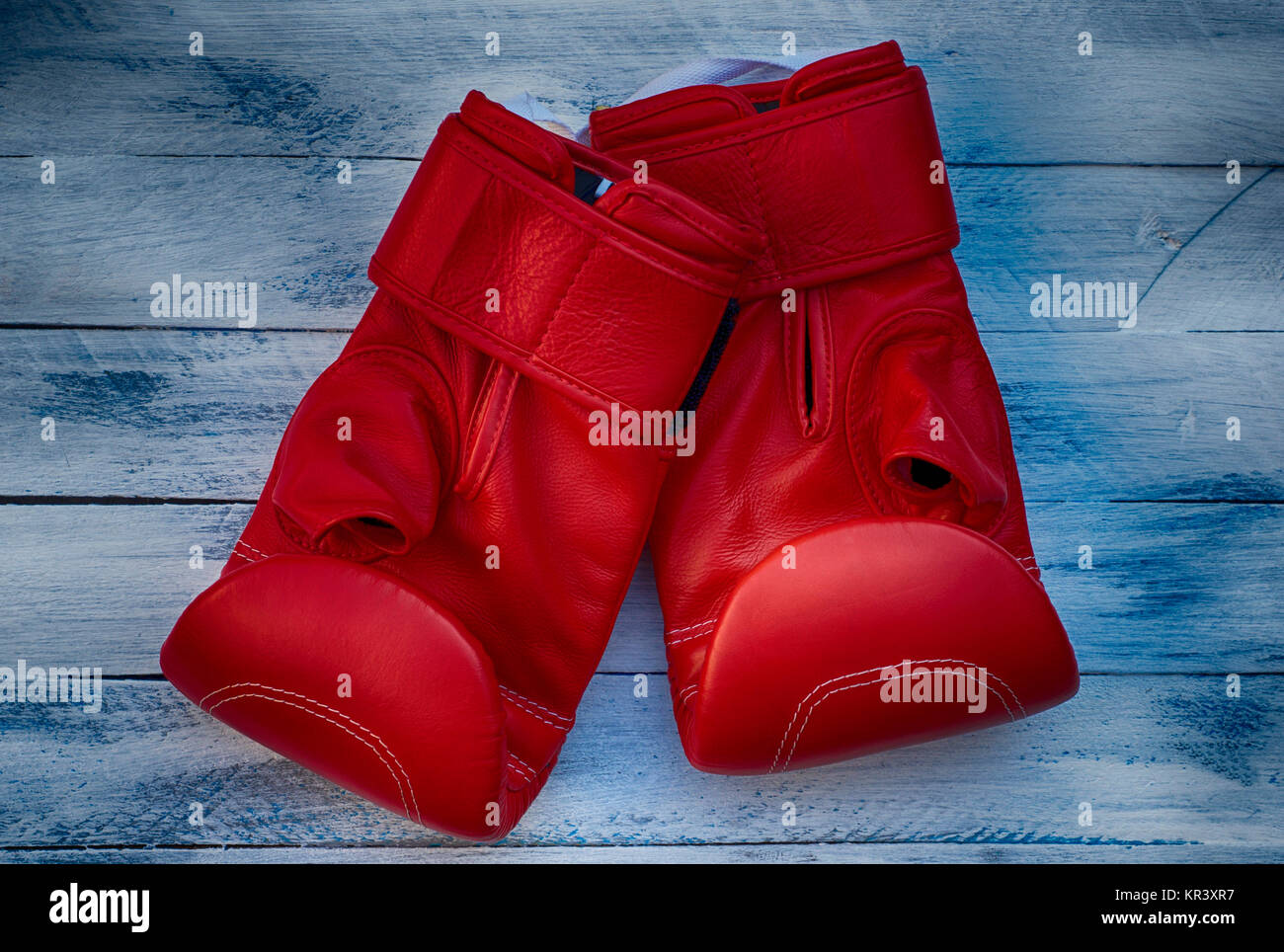 pair of red boxing gloves on the table, top view Stock Photo - Alamy