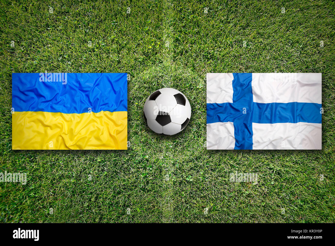 Ukraine vs. Finland flags on soccer field Stock Photo - Alamy