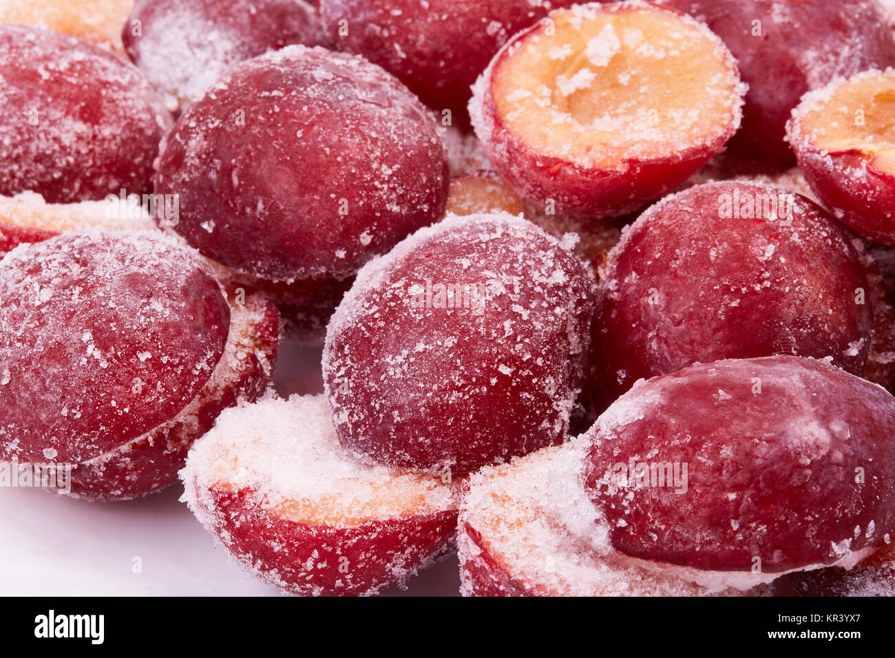 Frozen red plums Stock Photo - Alamy