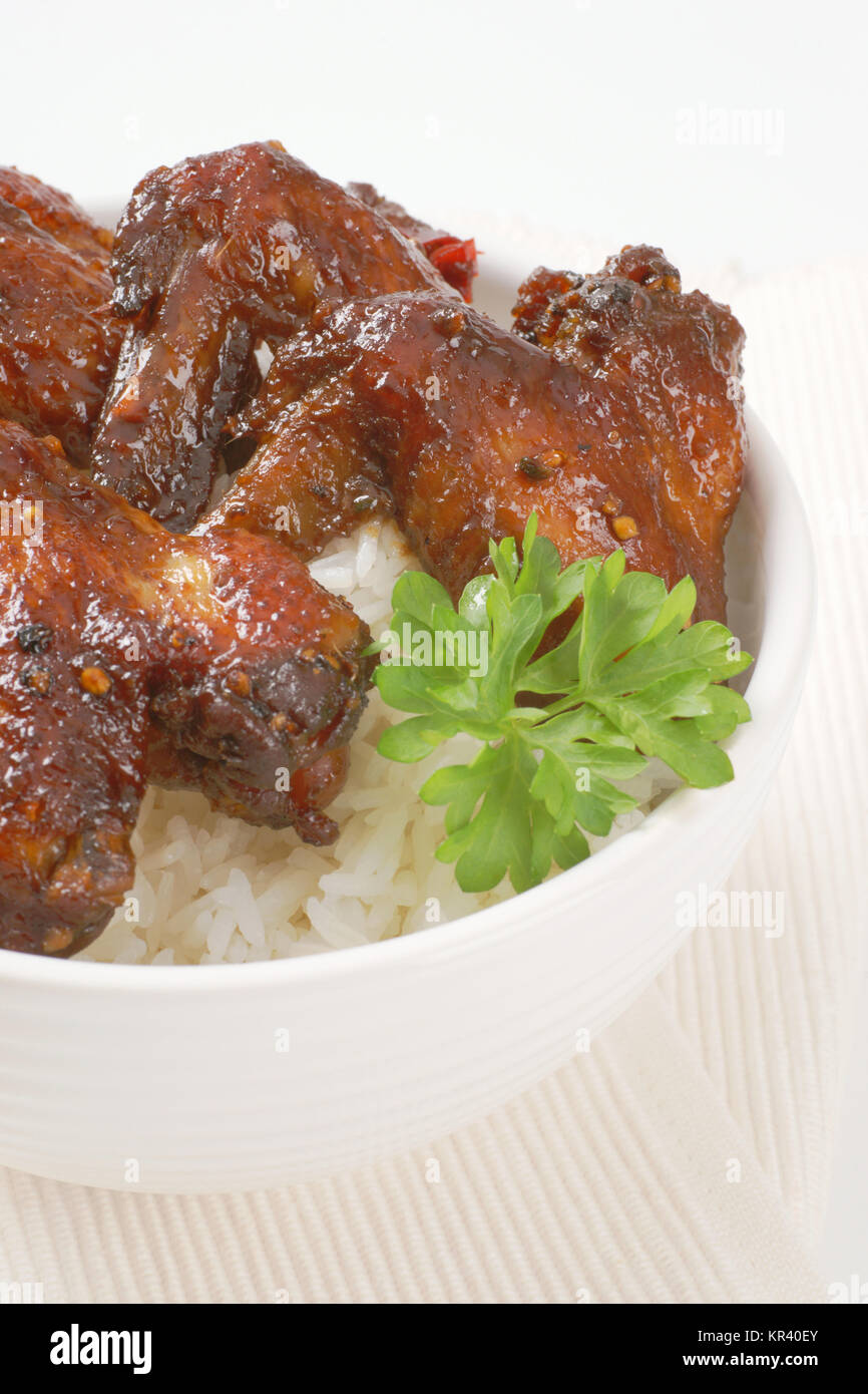 barbecue chicken wings with rice Stock Photo - Alamy
