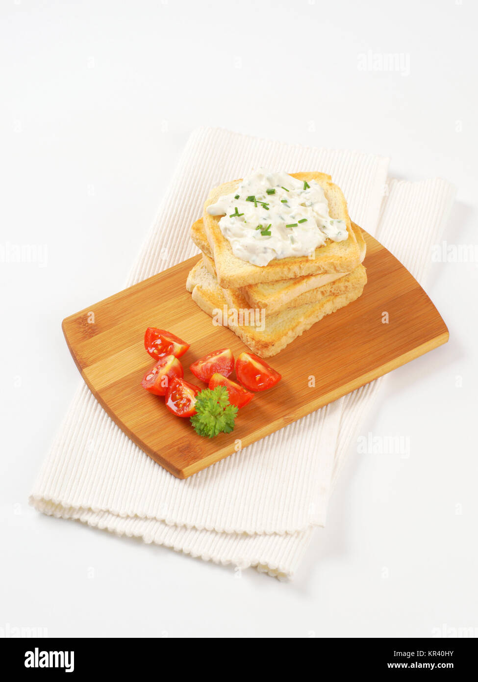 toasted white bread and creamy chives spread Stock Photo - Alamy
