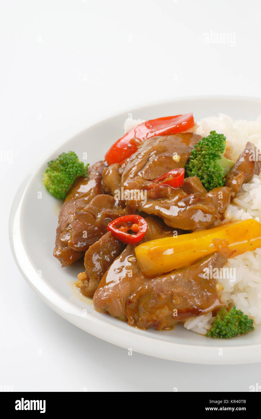 meat and vegetable stir fry with rice Stock Photo - Alamy