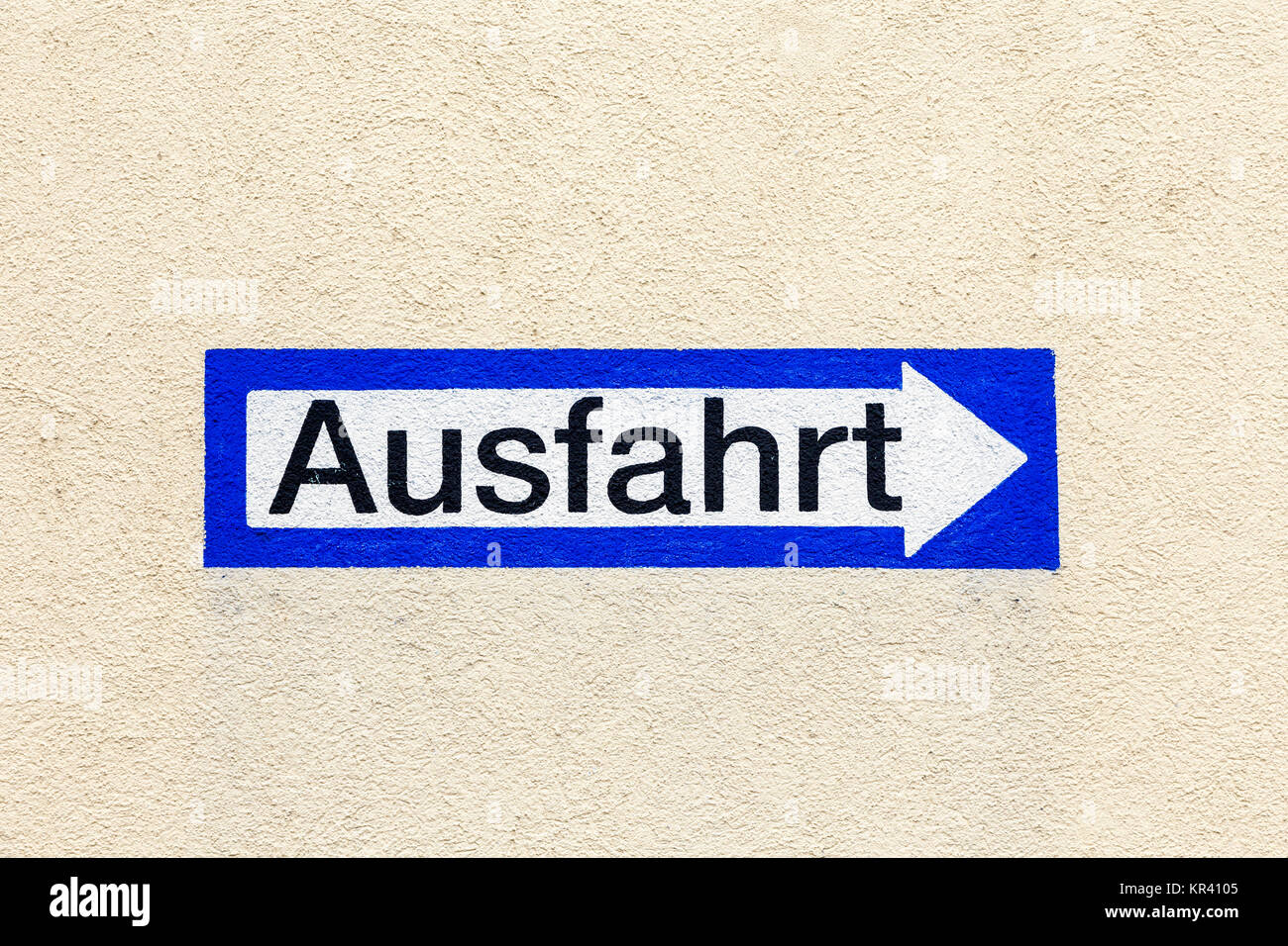 blue sign exit in german painted at a wall Stock Photo - Alamy