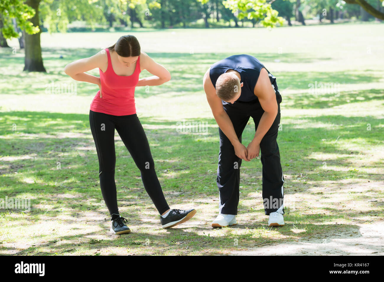 Exhausted Young Couple Stock Photo - Alamy