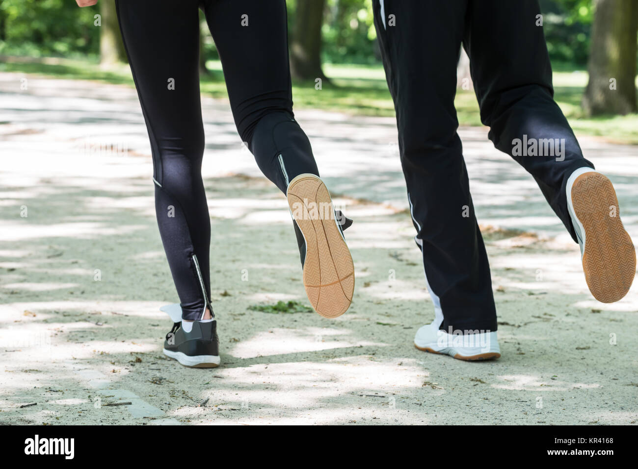 Athletic couple runs in hi-res stock photography and images - Alamy