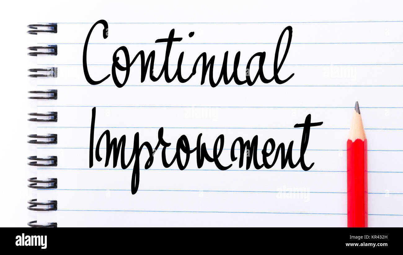 Continual Improvement written on notebook page Stock Photo - Alamy