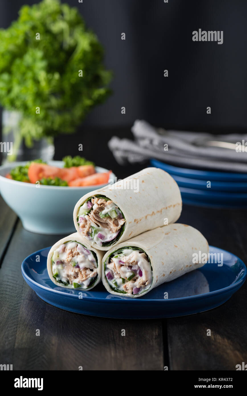 Tuna burritos with cucumber red onion and mayonnaise Stock Photo - Alamy