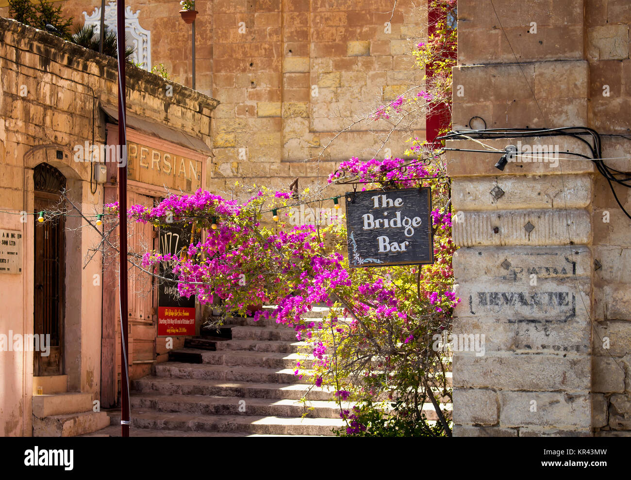 View of signage of a bar, flowers and stairs in Valletta / Malta Stock ...