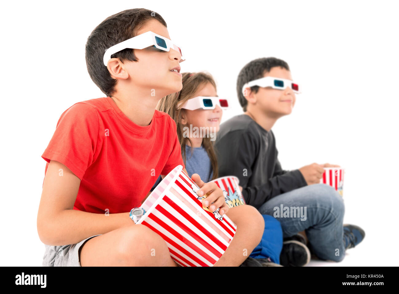 Kids in the movies Stock Photo - Alamy