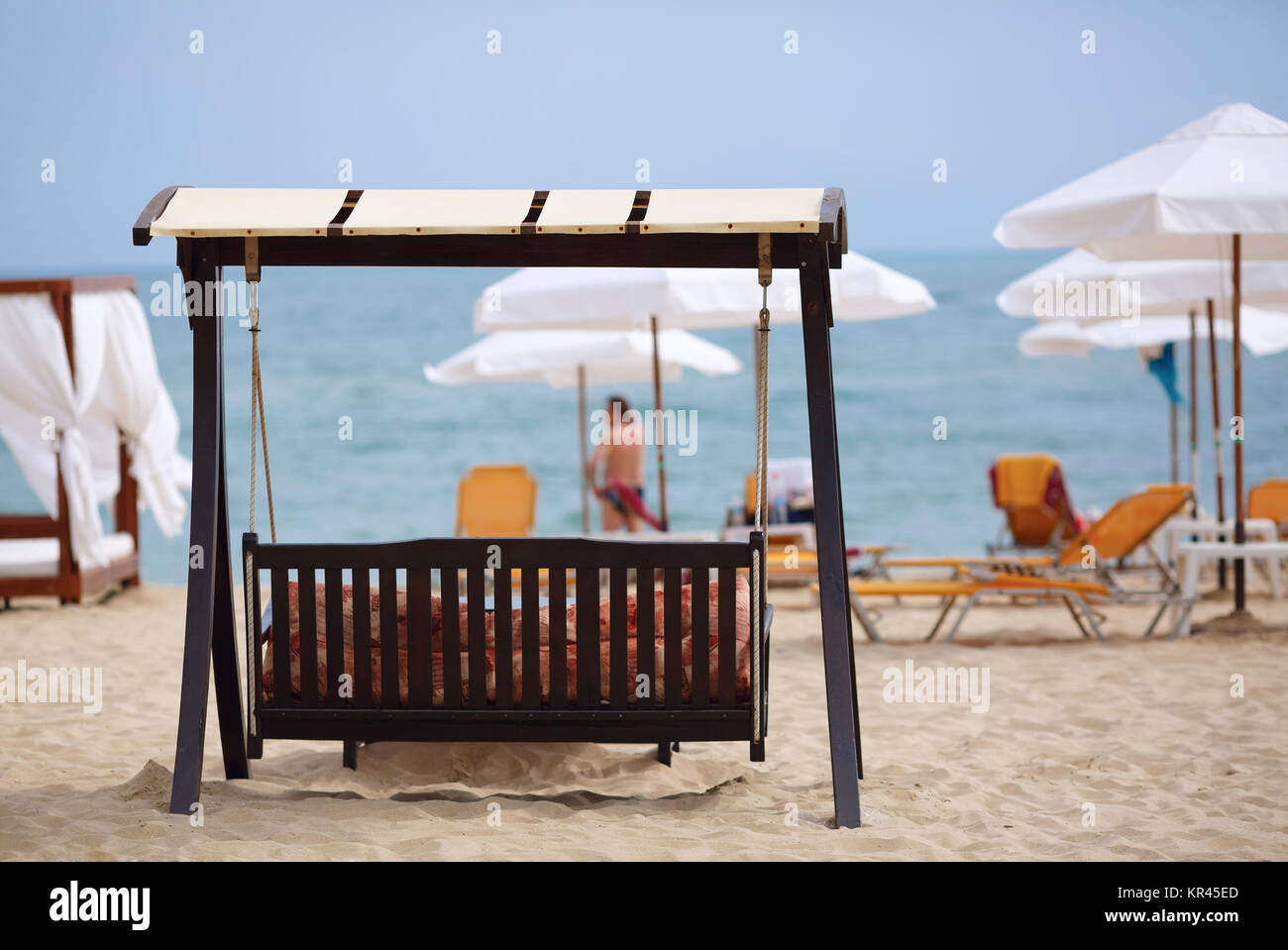 Swing on the beach Stock Photo - Alamy