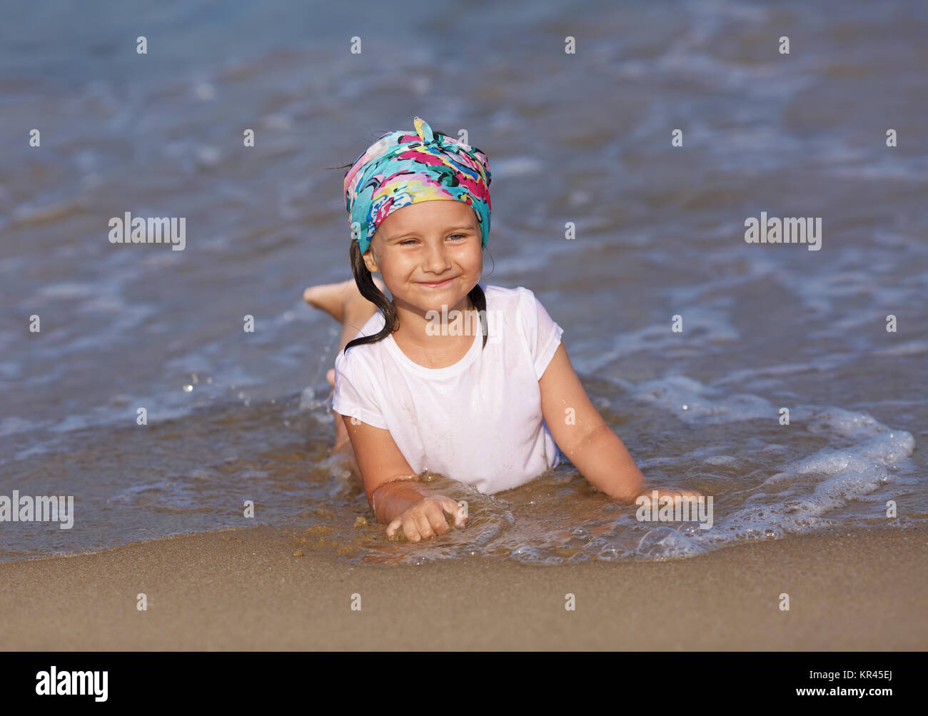 Child on beach Stock Photo - Alamy