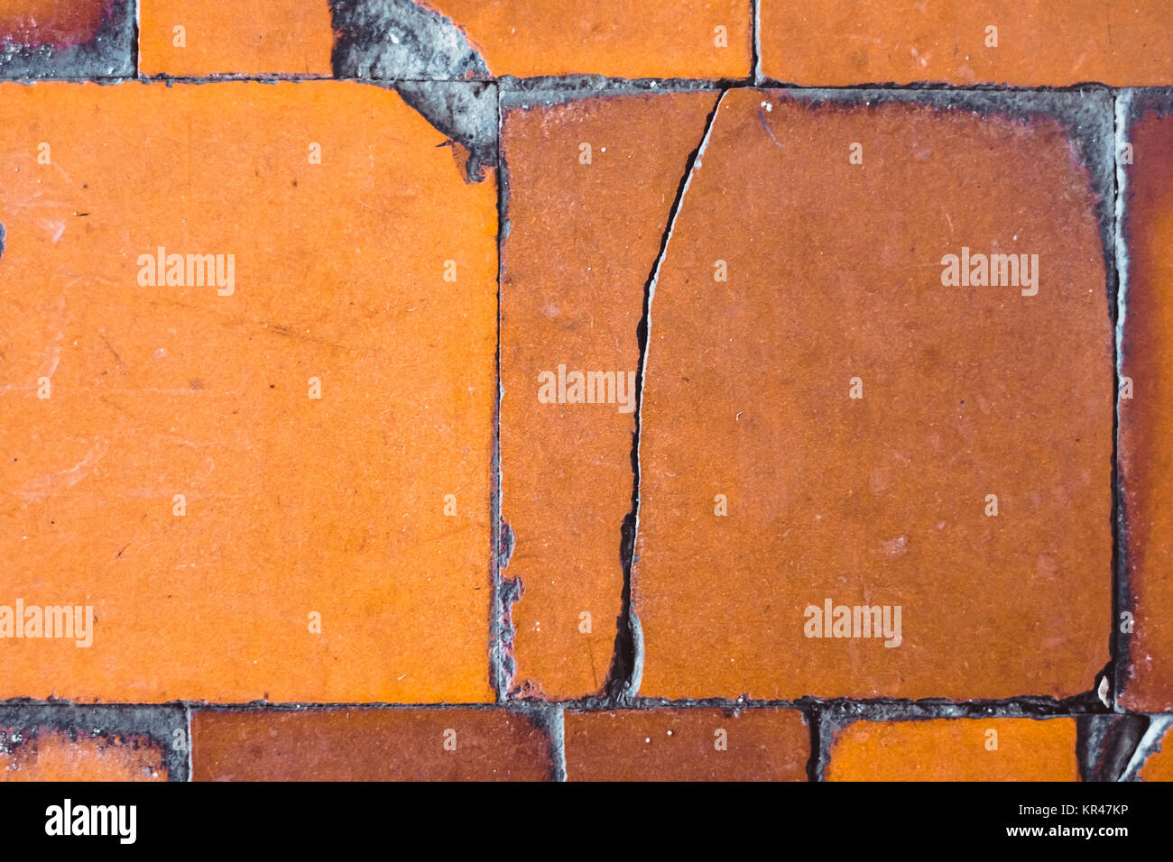 texture of the old cracked tiles on the floor Stock Photo - Alamy