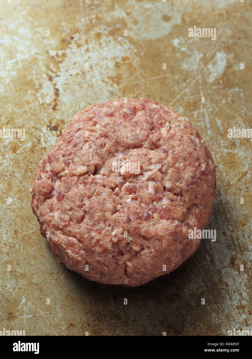 rustic uncooked hamburger patty Stock Photo - Alamy