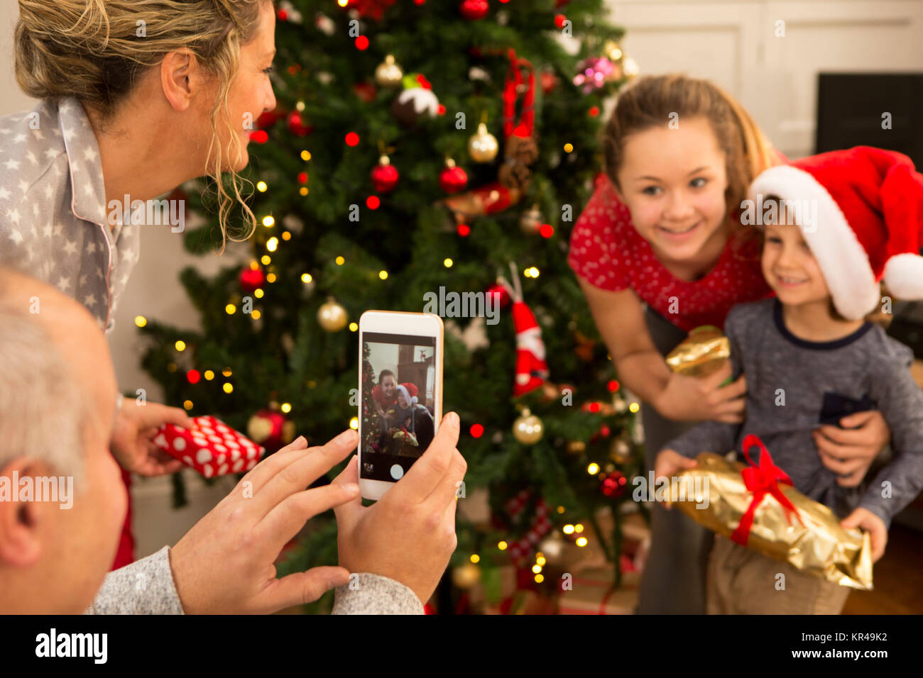 Family At Christmas Stock Photo - Alamy