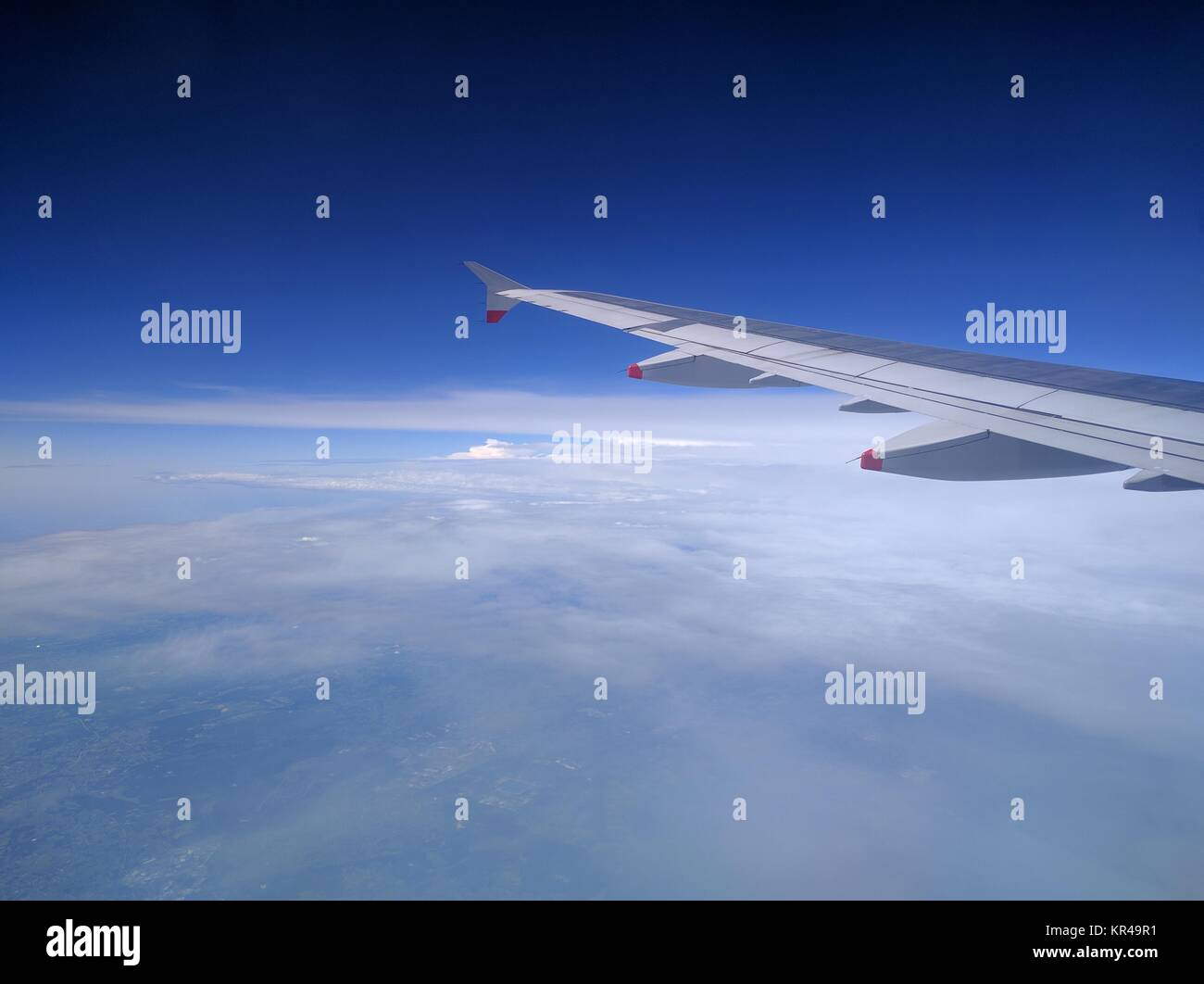 Airplane wing in the sky Stock Photo - Alamy
