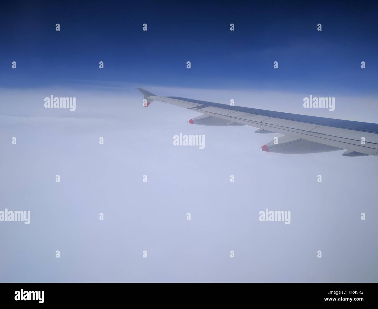 Airplane wing in the sky Stock Photo - Alamy