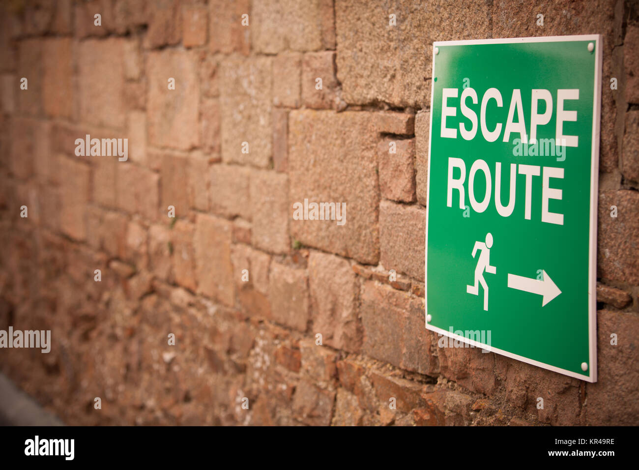Escape route indicator Stock Photo - Alamy