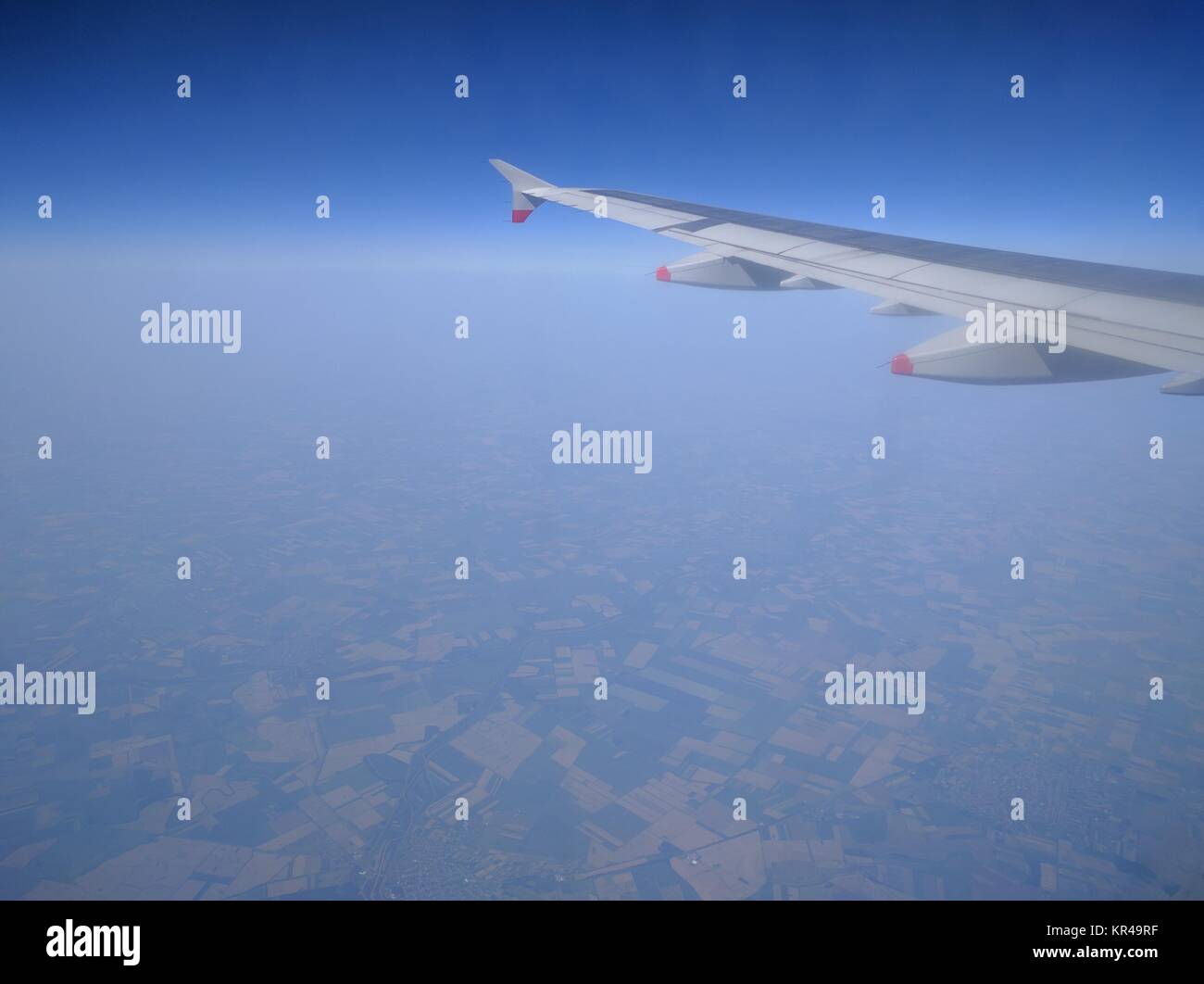 Airplane wing in the sky Stock Photo - Alamy
