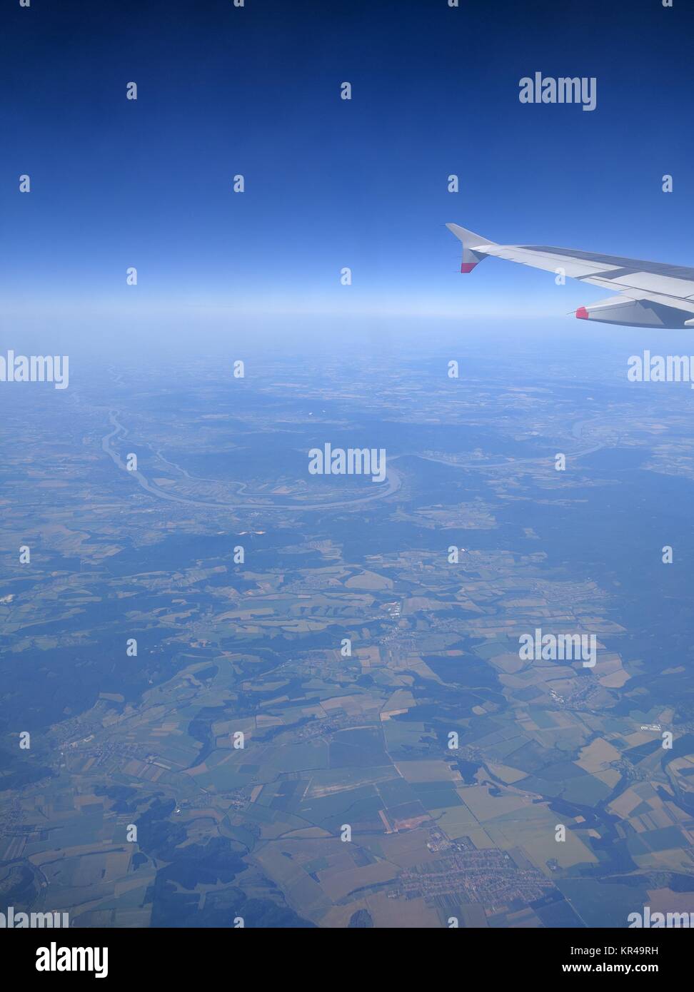 Airplane wing in the sky Stock Photo - Alamy
