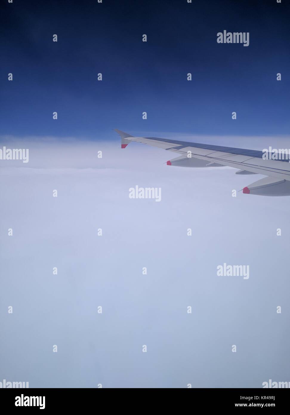 Airplane wing in the sky Stock Photo - Alamy