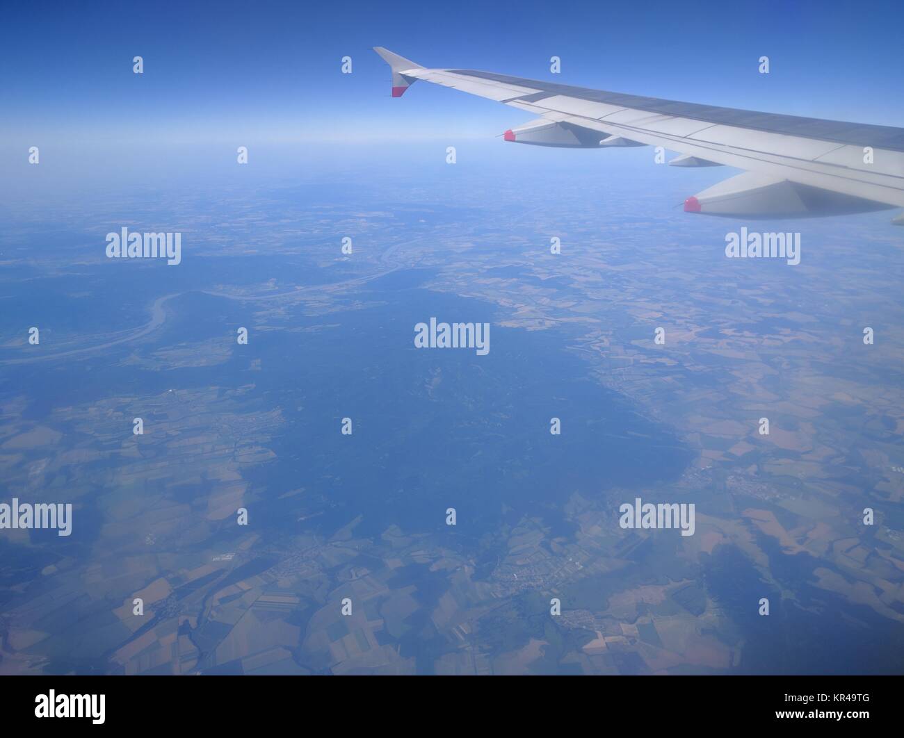 Airplane wing in the sky Stock Photo - Alamy