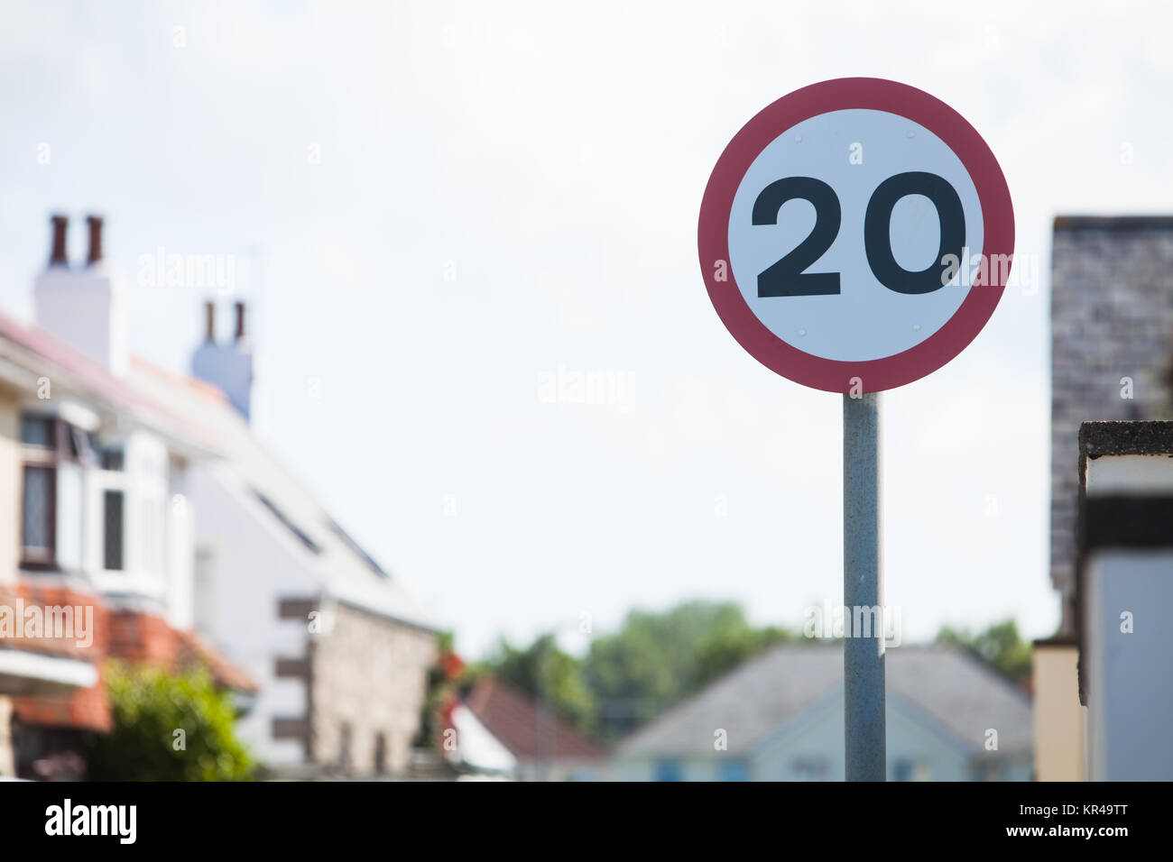 Speed restriction road sign Stock Photo - Alamy
