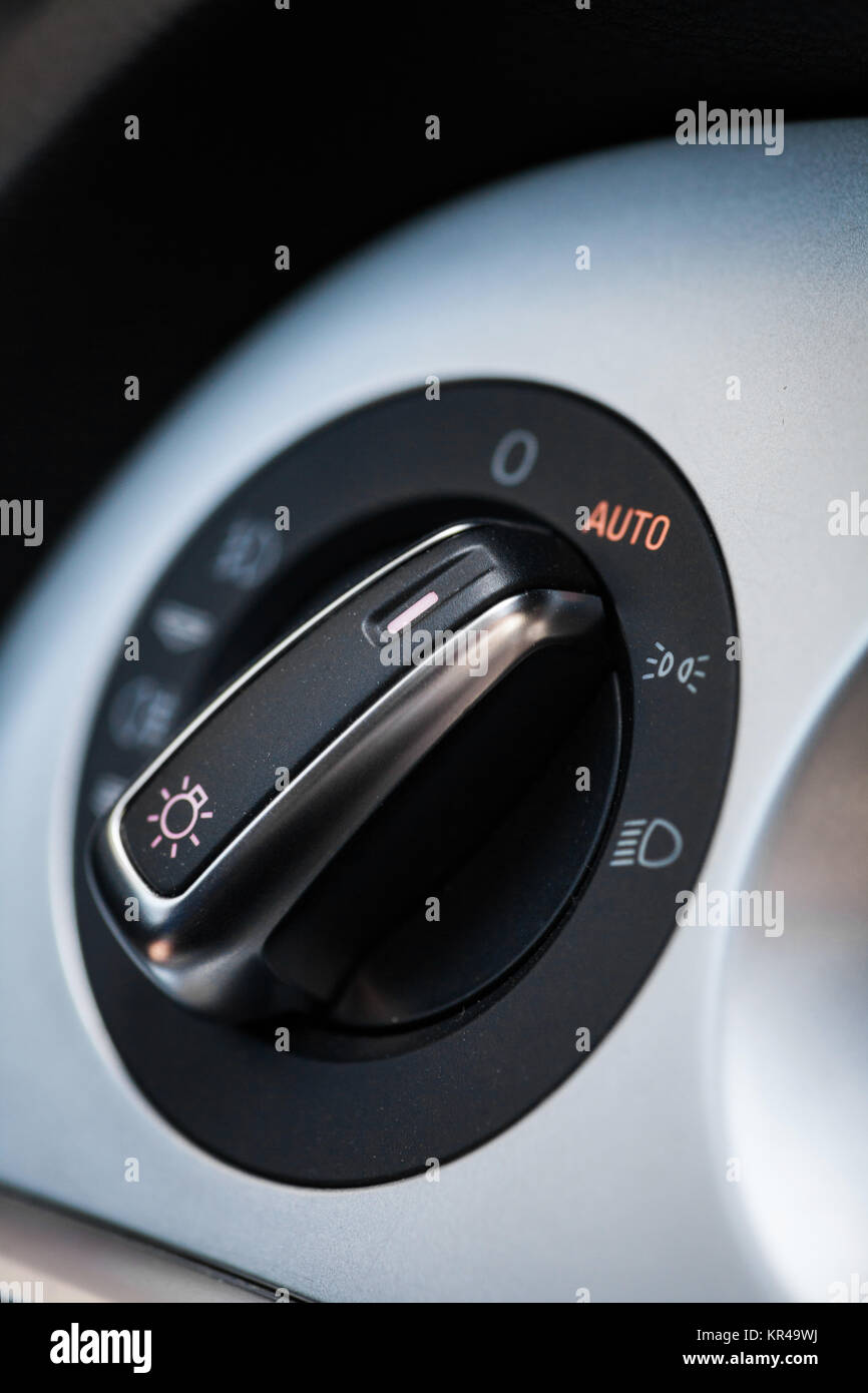 Car headlights button Stock Photo - Alamy