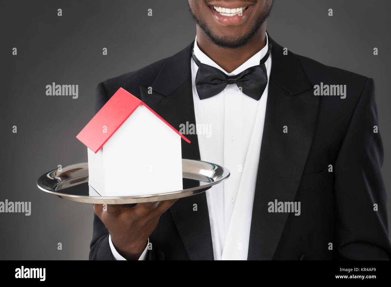 Butler in front of house hi-res stock photography and images - Alamy
