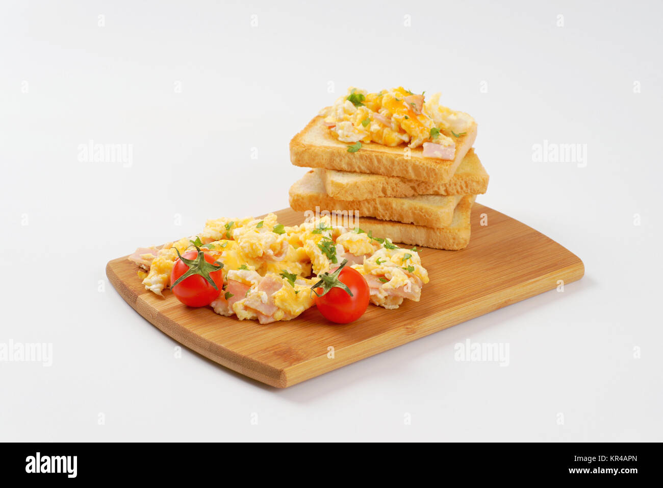 Scrambled eggs and toasted bread Stock Photo - Alamy