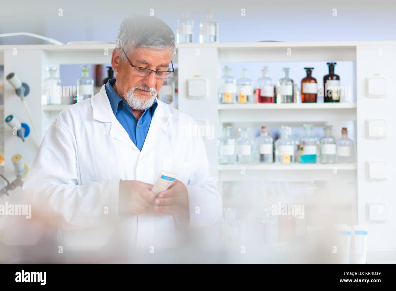 Senior chemistry professor/doctor in a lab (color toned image Stock ...