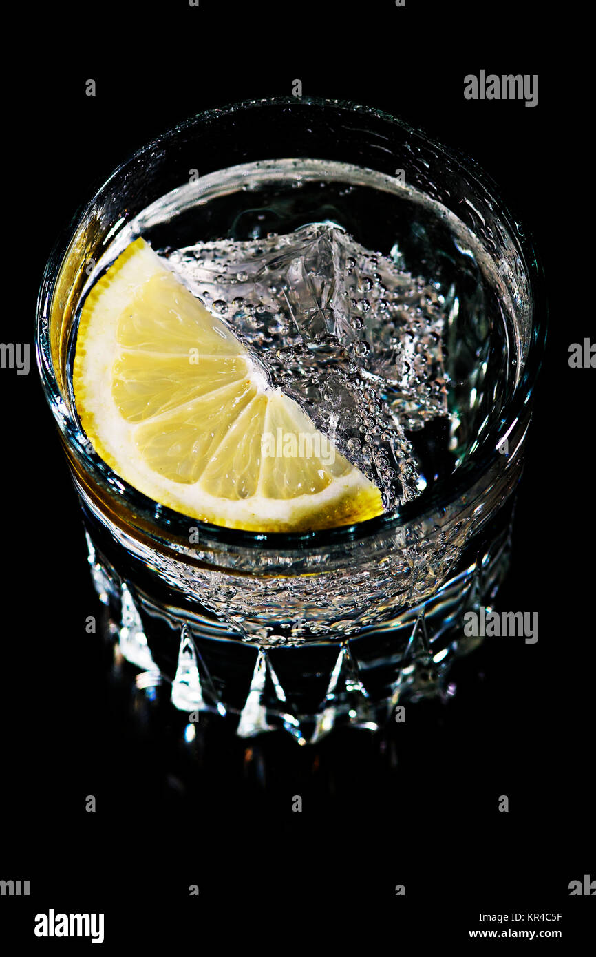 Soda with ice and lemon Stock Photo - Alamy