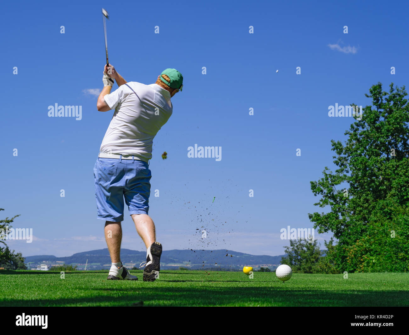Golfer playing on golf course Stock Photo - Alamy