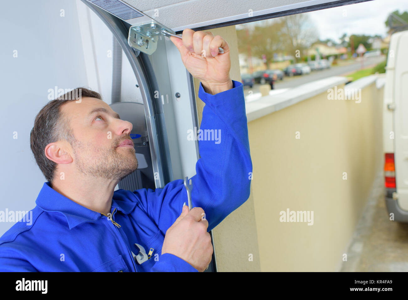 Fixing a damaged door Stock Photo - Alamy