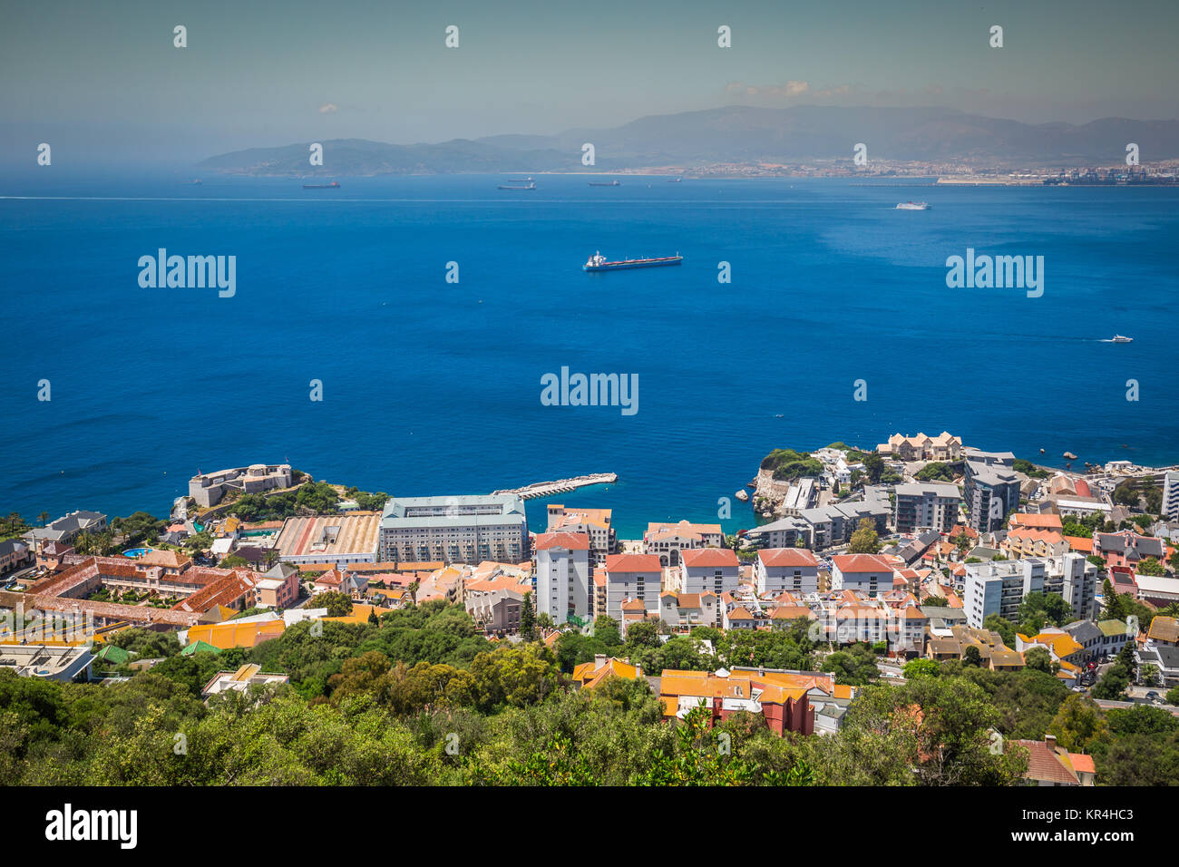 an aerial view of Gibraltar, its marina and the Mediterranean sea as ...