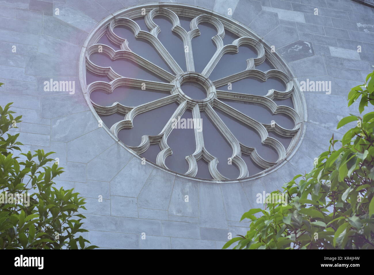 Circular ornamental window in store wall of Christian cathedral Stock ...