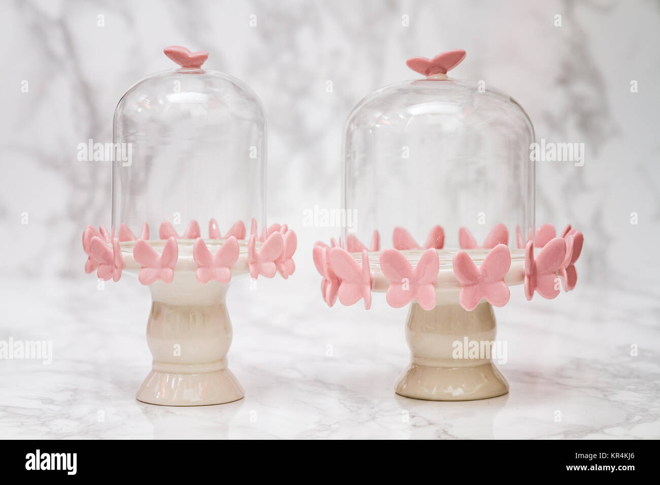 Empty bell jar pink butterfly design white hi-res stock photography and ...