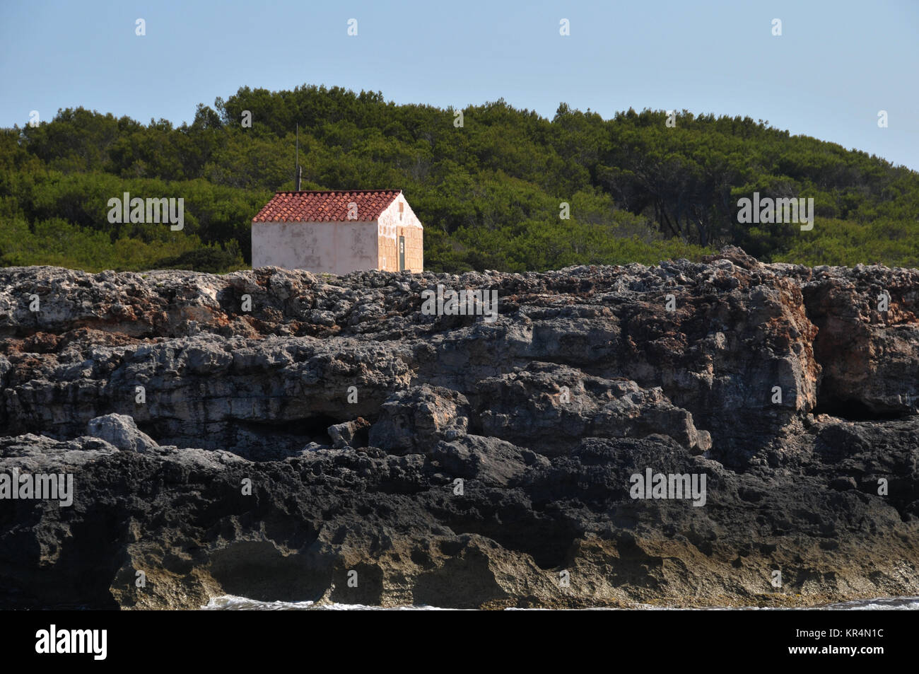 house on the rocky coast of menorca Stock Photo - Alamy