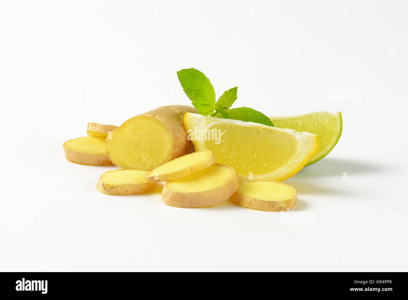 sliced ginger with lemon and lime Stock Photo - Alamy